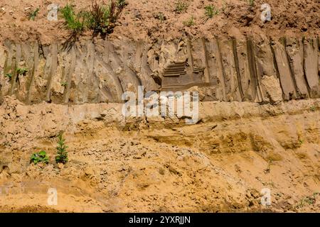Excavator bucket marks on quarry wall Stock Photo - Alamy