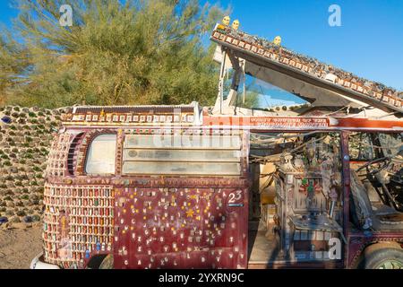 Highly decorated VW bus in East Jesus, California. East Jesus is an ...