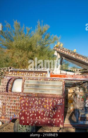 Highly decorated VW bus in East Jesus, California. East Jesus is an ...
