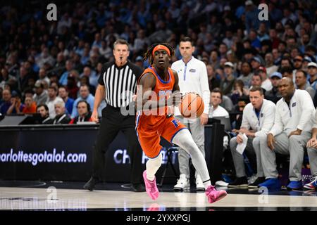 Florida guard Denzel Aberdeen (11) drives during the first half of an ...