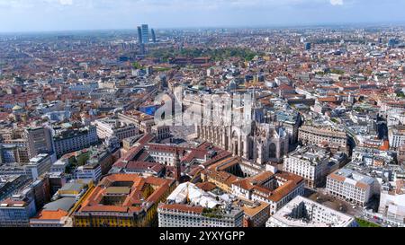 A breathtaking cityscape of modern buildings surrounded by water in ...