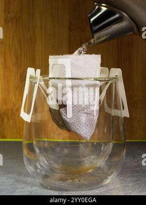 A closeup of coffee being poured into a cup from a machine Stock Photo ...