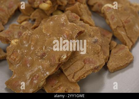 Peanut Brittle candy snack ready to eat Stock Photo - Alamy