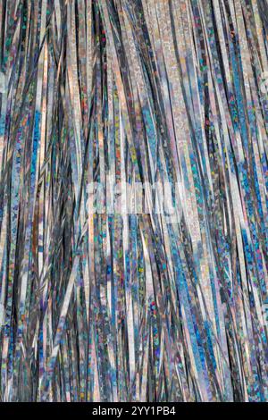 Silver tinsel lametta for Christmas decoration Stock Photo - Alamy