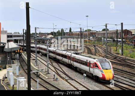 LNER Azuma train heads into Doncaster Railway Station, East Coast Main Line Railway, South ...