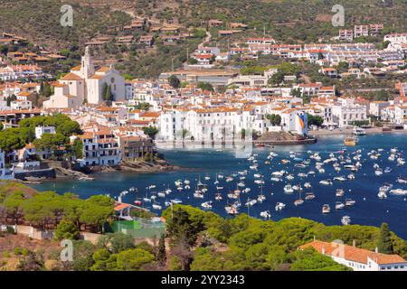 View of the coastal town of Cadaques with the historic white church of ...