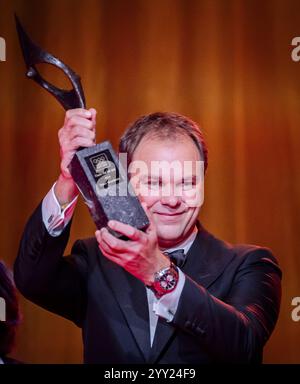 ARNHEM - Rowing coach Eelco Meenhorst on the podium after winning Coach ...