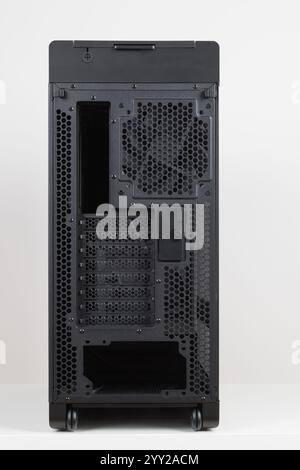 Back side of empty big tower computer case, chassis , effortless ...