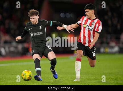 Liverpool's Harvey Elliott, left, and Southampton's Mateus Fernandes ...
