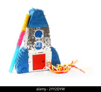 Rocket shaped pinata and stick isolated on white Stock Photo - Alamy