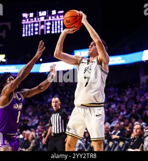 James Madison guard Xavier Brown (1) drives around Georgia Southern ...