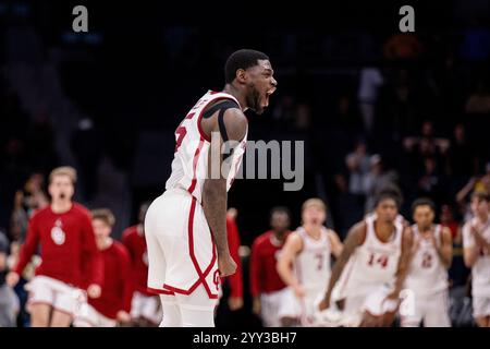 Oklahoma guard Duke Miles (15) shoots past Alabama guard Chris ...