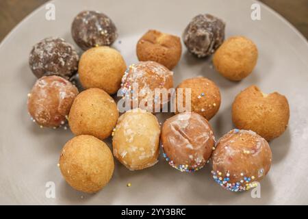 Set of mini size bite size donuts snack Stock Photo - Alamy