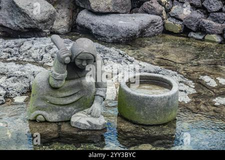 Traditional bathing pool along the Jeju Olle Trail in rural Jeju Island ...