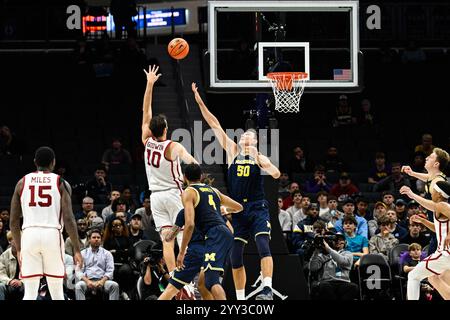 Michigan center Vladislav Goldin shoots a free throw during the first ...