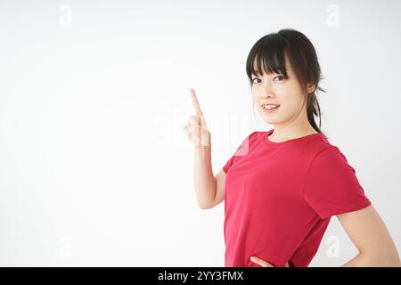 Sports instructor pointing finger Stock Photo - Alamy