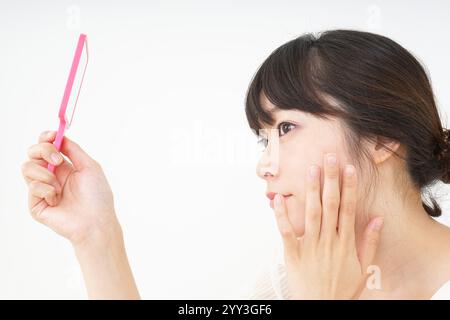 Women caring for rough skin Stock Photo - Alamy