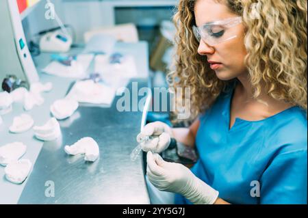 One day with dental female technican in his laboratory Stock Photo - Alamy