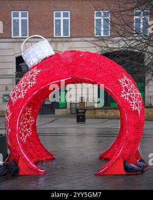 Santa's red grotto in the market place at Kettering, England, on a wet ...