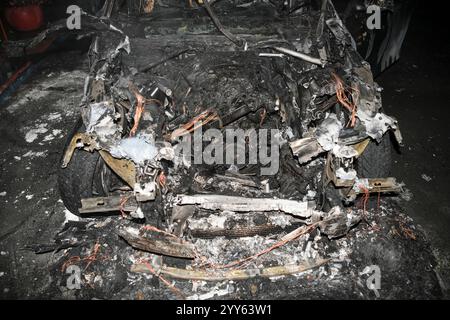 Car exploded and destroyed on fuel pump in accident. Closeup view of ...