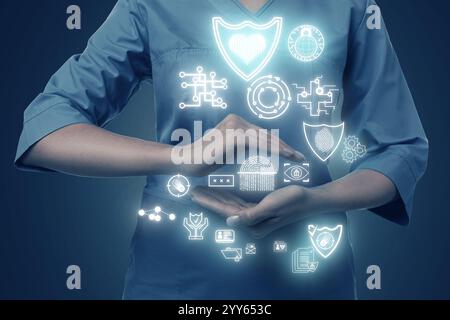 Medical privacy and confidentiality. Doctor with different icons coming ...