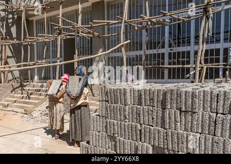 Old women carrying large stones to build a new Building, Addis Ababa ...