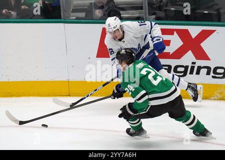 Toronto Maple Leafs Mitch Marner plays with his dog Zeus on the ice ...