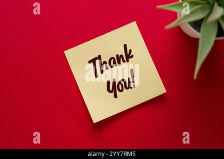 Handwritten Thank You on Yellow Sticky Note - Bright yellow sticky note ...