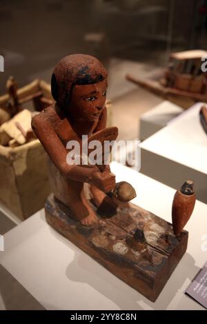 Ancient Egyptian wooden model of a man cooking a duck, New Kingdom, 11 ...