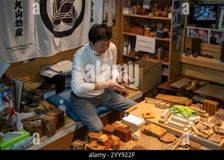 Demonstration at the Hakone Maruyama wood inlay handicraft store in ...