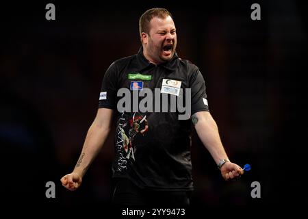 Alexander Merkx celebrates victory against Stephen Burton (not pictured ...