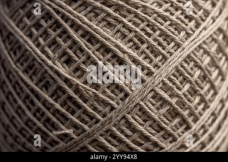 linen sewing threads in production, a new skein of grey thread is used ...