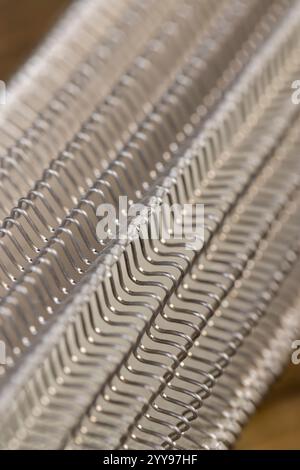 old curved heating wire made of metal in dust and pollution Stock Photo ...