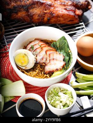 Chinese combo claypot rice with pork ribs and tender chicken on dark ...
