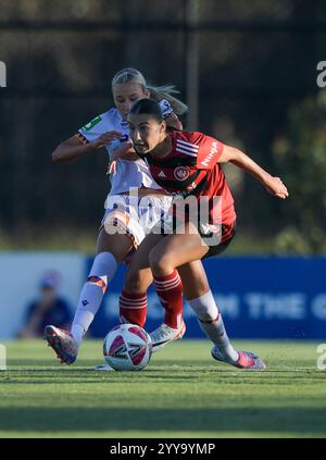 Georgia Cassidy of Perth Glory FC and Maria Rojas of Canberra United in ...