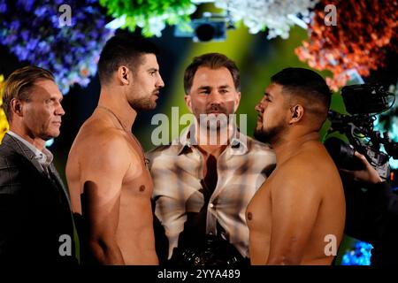 Andrii Novytskyi (left) and Edgar Ramirez during a weigh-in in Riyadh ...