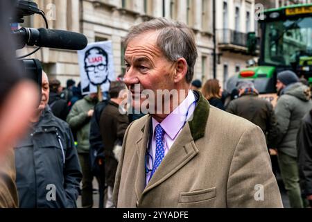 Reform UK MP Rupert Lowe attends a farmers protest in Whitehall, London ...