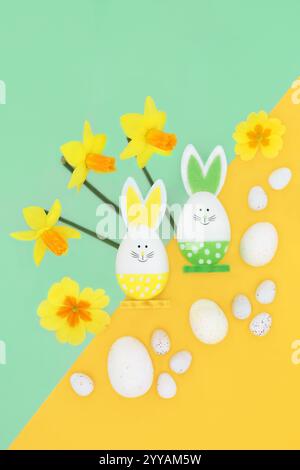 Easter concept. Primrose Primula with yellow flowers in flowerbed in ...