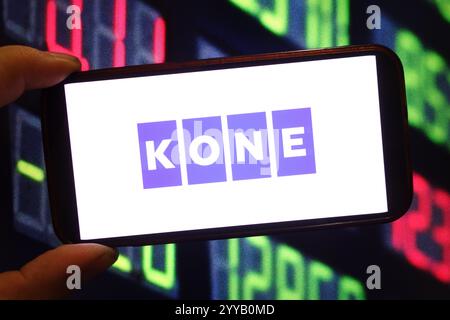 In this photo illustration, the KONE company logo is seen displayed on ...