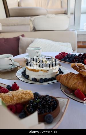 Delightful Breakfast Spread With Coffee, Pastries, and Fresh Fruit in a ...