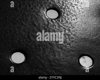 Triangle in the Making: Three Holes on a Metal Surface Stock Photo - Alamy
