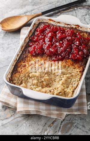 Rice and liver casserole Maksalaatikko with Cranberry sauce closeup on ...