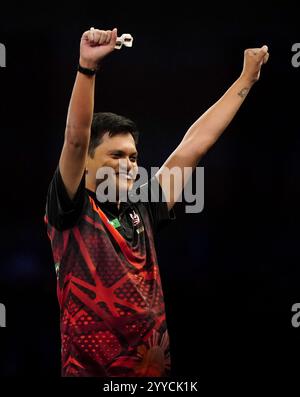 Alexis Toylo celebrates after winning his match against Richard ...