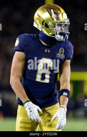 Notre Dame wide receiver Jordan Faison (6) tackles Ohio State wide receiver Brandon Inniss (11 ...