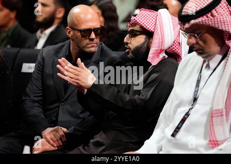 Turki Al-Sheikh speaking with actor Jason Statham (left) at the Kingdom Arena in Riyadh, Saudi ...