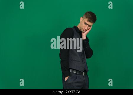 Photo of cheerful dreamy guy dressed yellow pullover arm chin looking ...