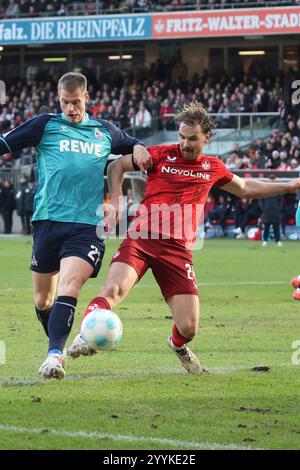 Kaiserslautern, Deutschland. 22nd Dec, 2024. Die Spieler des 1. FC K?ln feiern den Sieg und ...