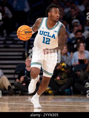 UCLA guard Sebastian Mack (12) shoots against Michigan State center ...