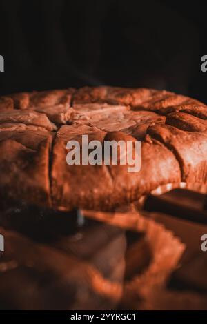 Chicken pie front view close up. Display case with a variety of cakes ...