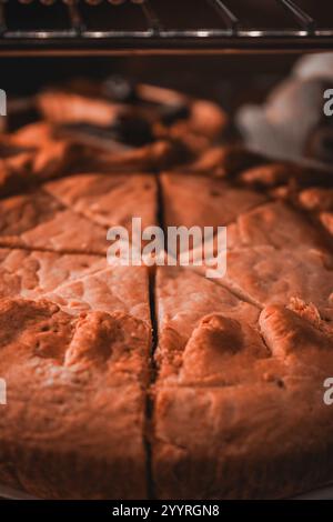 Chicken pie front view close up. Display case with a variety of cakes ...